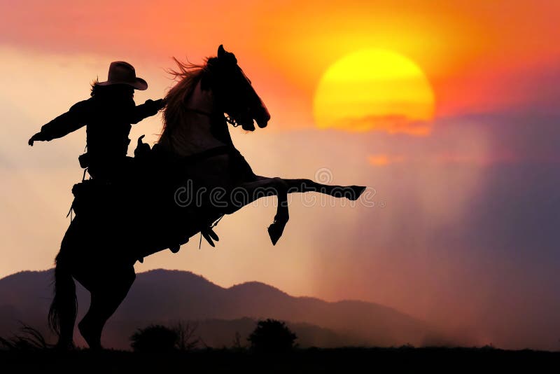 The Silhouette of the Cowboy and Setting Sunset Stock Photo - Image of ...