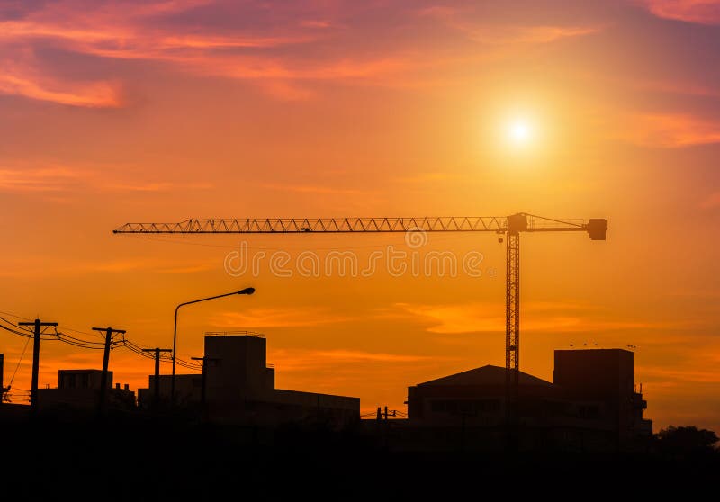 Big Crane on Building Construction Site with Sunset Stock Image - Image ...