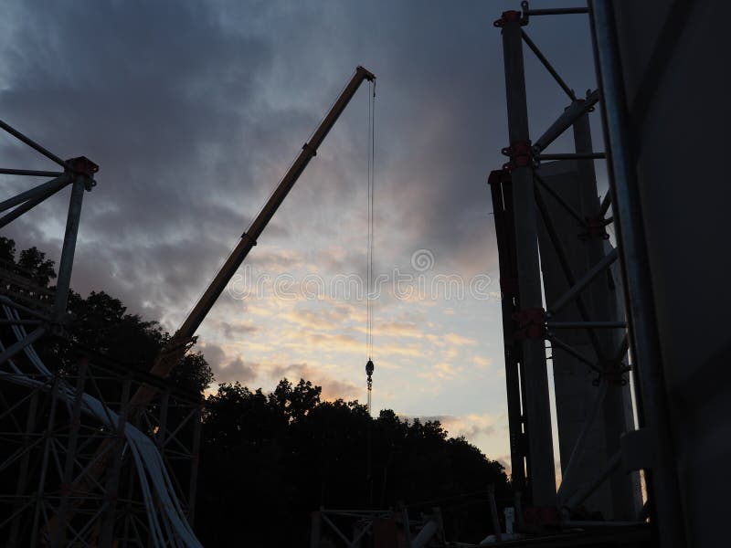 Silhouette of a Crane, the Sky in the Shadows, during Work, Stock Photo ...