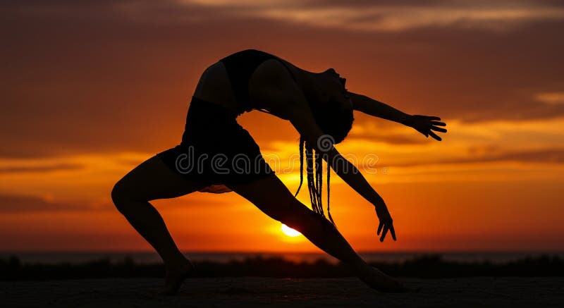 Silhouette of a Dancer Performing a Backbend Against a Vibrant Sunset ...