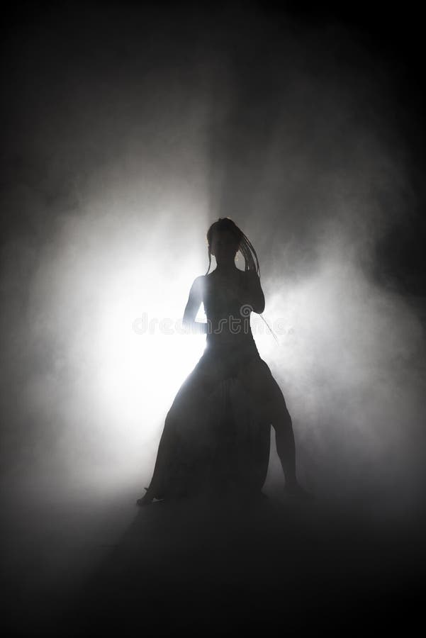 Silhouette Dancer Performing Dance Figures. Stock Photo - Image of legs ...