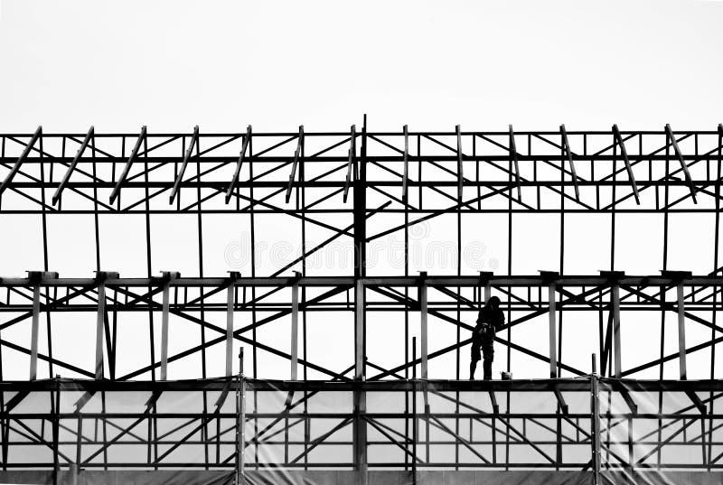 Silhouette of Engineer Standing To Work Safely on High Structure of the ...