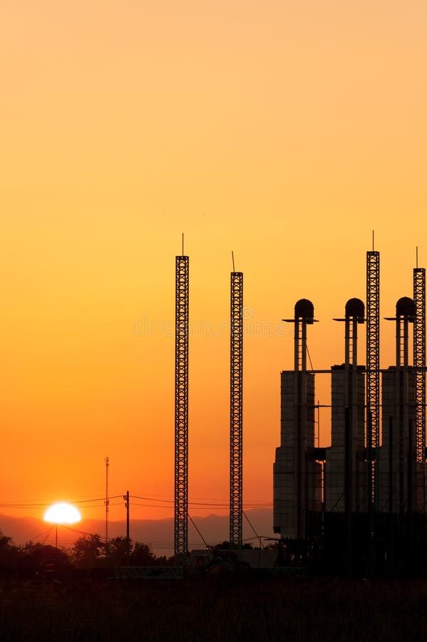 Silhouette of Factory at Sunset Stock Photo - Image of construction ...
