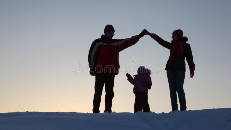 Silhouette family three do stock footage. Video of silhouette - 321026654
