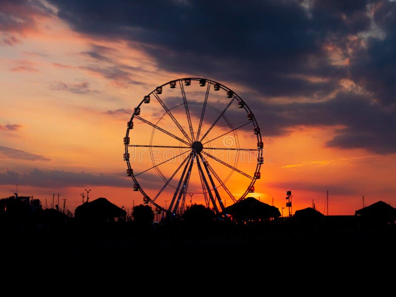 Silhouette of the Ferris Wheel at Sunset Stock Photo - Image of union ...