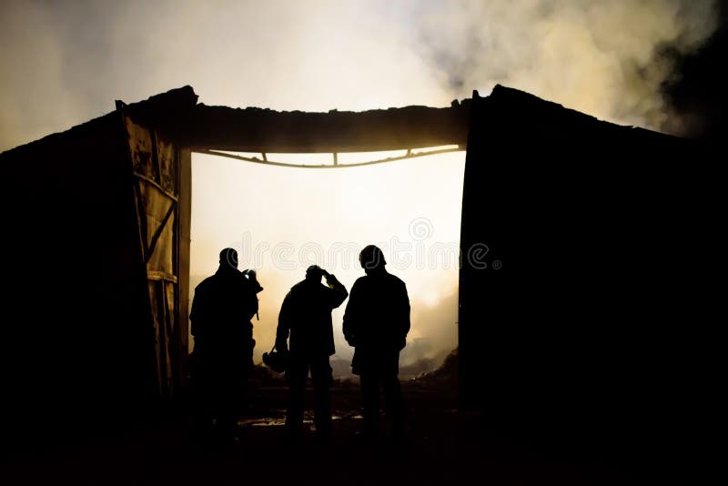 Silhouette of Fireman Fighting Bushfire at Night Stock Image - Image of ...