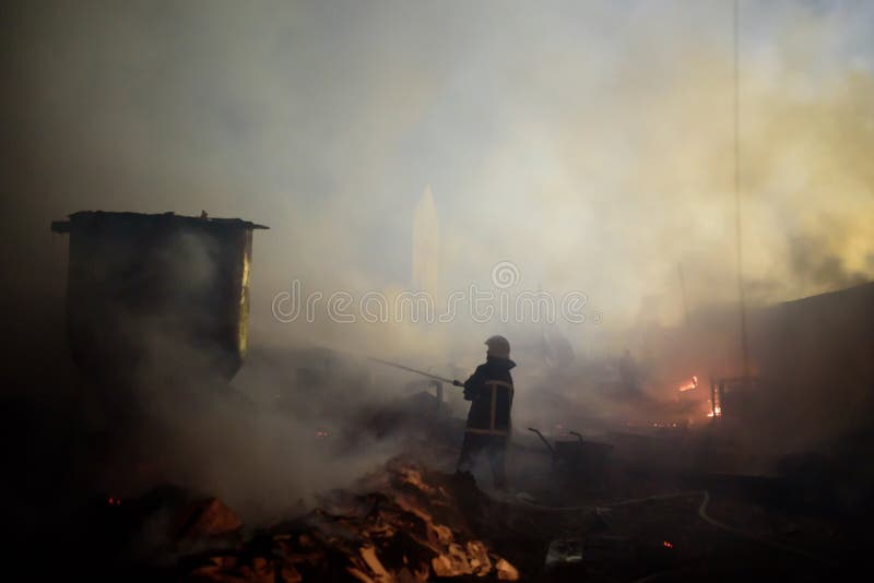 Silhouette of Fireman Fighting Bushfire at Night Stock Image - Image of ...
