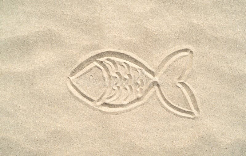 Silhouette of a Fish Painted on the Sand Stock Image - Image of ...