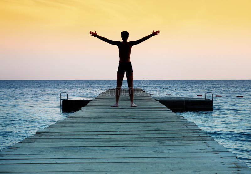Silhouette of Free Peaceful Man at Sunset Stock Photo - Image of ...