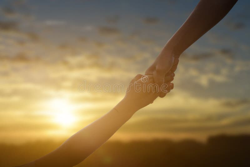 Silhouette of Giving a Help Hand, Hope and Support Each Other Over ...
