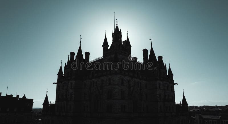 Silhouette of a Gothic-style Castle with Multiple Pointed Towers and ...