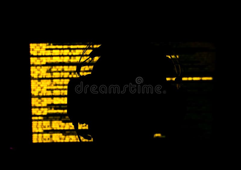 Silhouette of a Hacker Sitting in Front of a Monitor Stock Photo ...