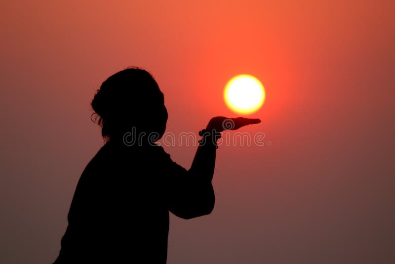 Silhouette of Hand Holding Sun at Sunrise Stock Photo - Image of idea ...