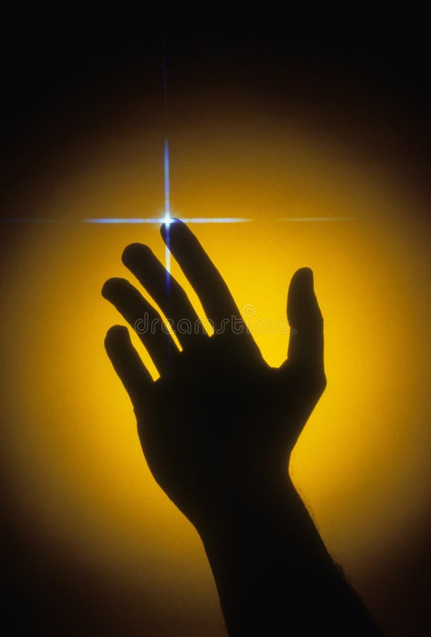 Silhouette of Hand with Light Burst Stock Image - Image of magical ...