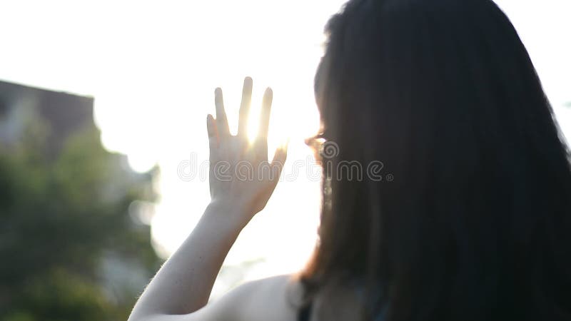 Silhouette of Hand on Rainy Window with Water Droplets Stock Footage ...