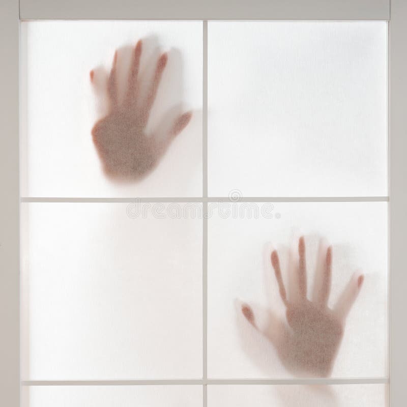 Silhouette of Hands Trapped Behind Translucent Screen Stock Image ...