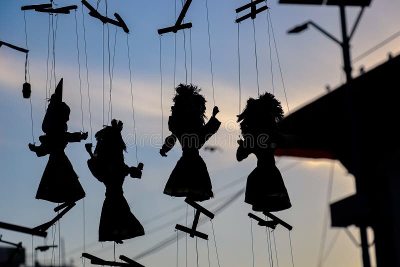 Silhouette of Hanging Puppet Dolls in Kathmandu Stock Photo - Image of ...