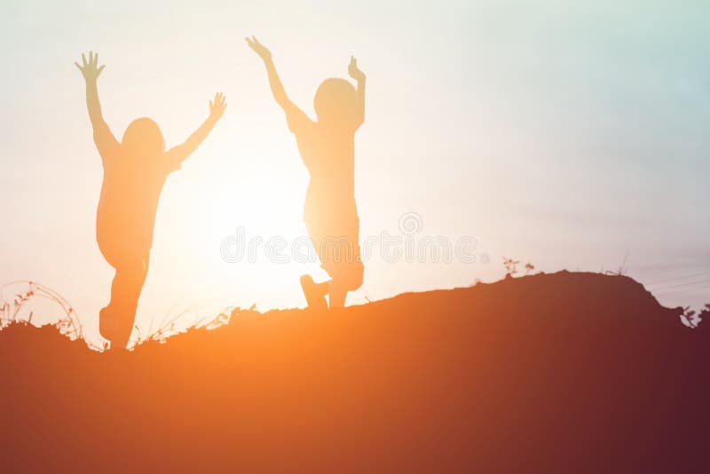 Silhouette of a Happy Children and Happy Time Sunset Stock Image ...
