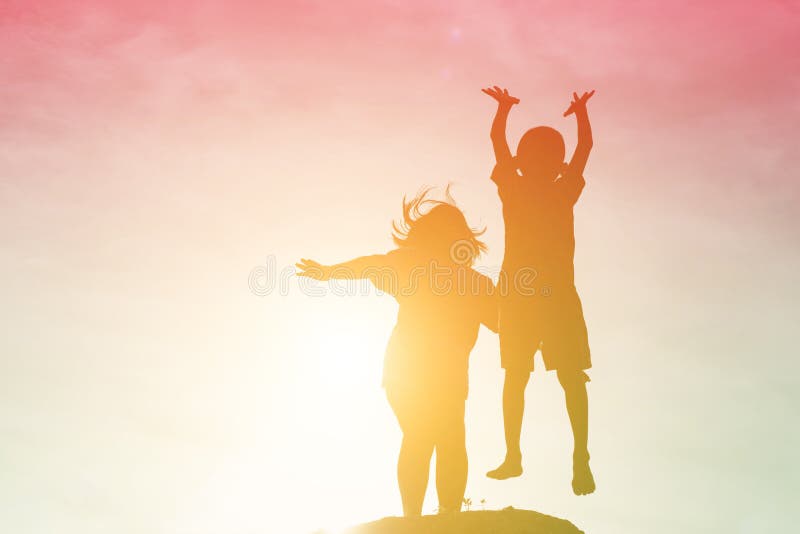 Silhouette of a Happy Children and Happy Time Sunset Stock Image ...
