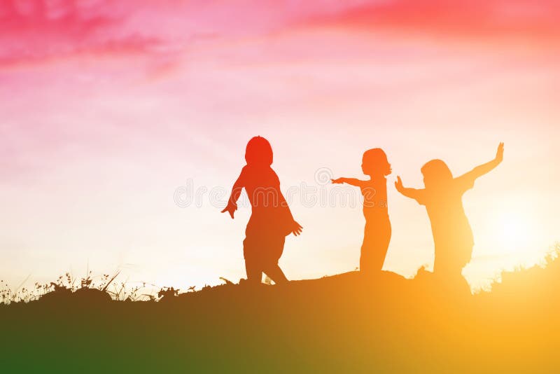Silhouette of a Happy Children and Happy Time Sunset Stock Photo ...