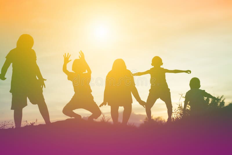 Silhouette of a Happy Children and Happy Time Sunset Stock Image ...
