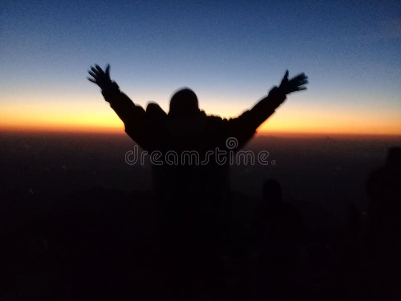 Silhouette of a Happy Person on a Sunset Stock Image - Image of ...