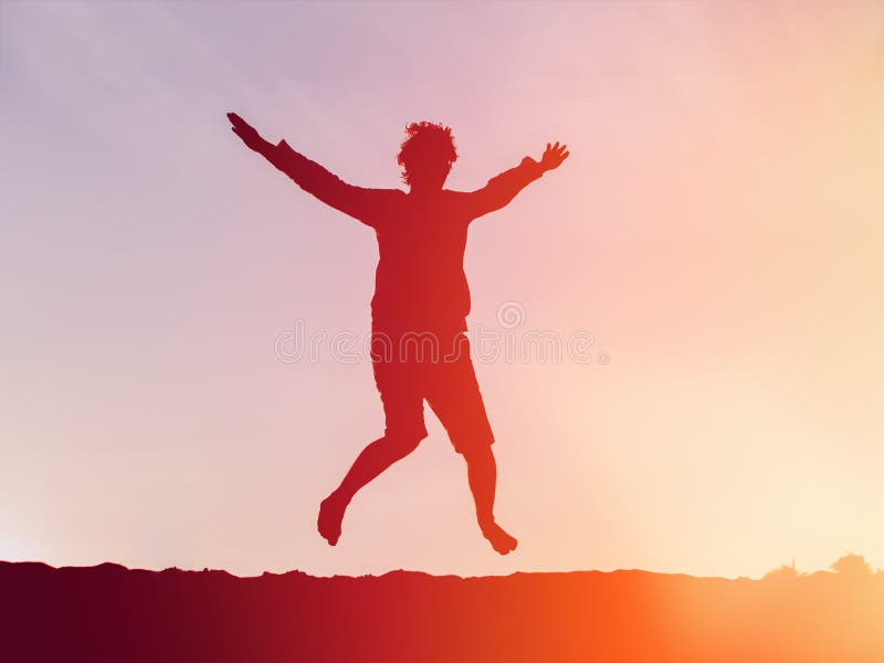 Silhouette of Happy Young Man Jumping at Sunset Stock Image - Image of ...