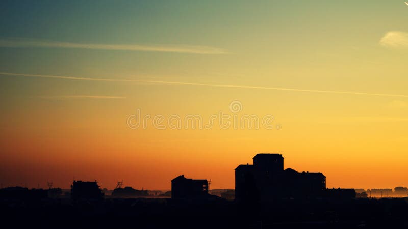 Silhouette Of High Rise Building Under Golden Sun Picture. Image: 83063216