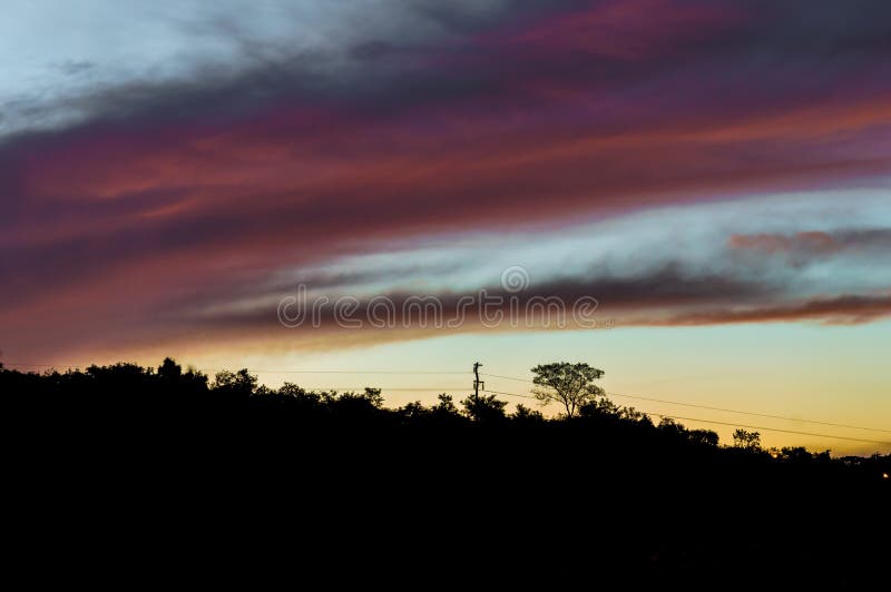 Silhouette of a Hill during Acolorful Sunset Stock Image - Image of ...