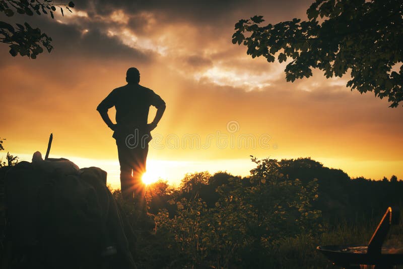 Silhouette of Human Looking at Sunset in the Forest Stock Image - Image ...
