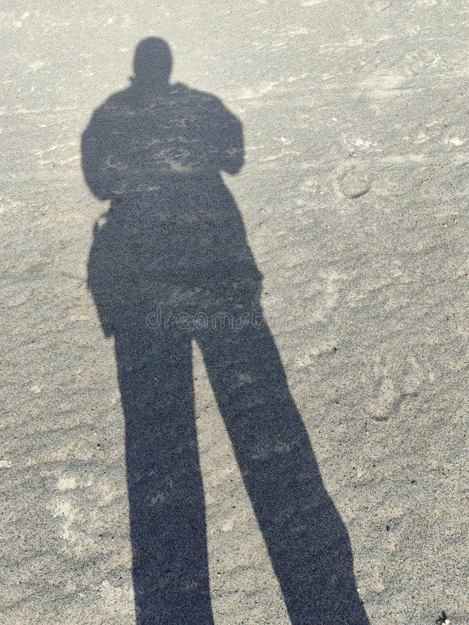 Silhouette of Human Shadow on Sand Field in the Morning Stock Photo ...
