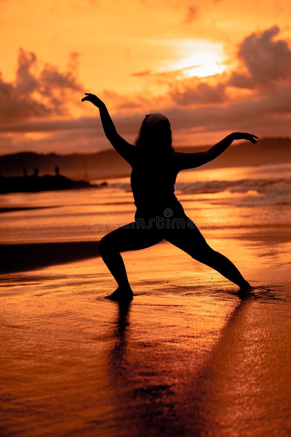 Silhouette Image of an Asian Woman Doing Ballet Movements Very Flexibly ...