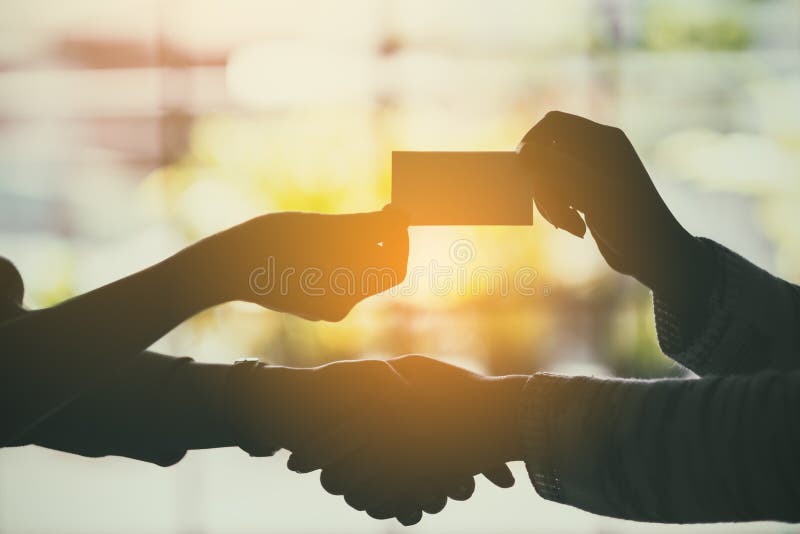 Two People Shaking Hands and Exchanging Empty Business Card Stock Image ...