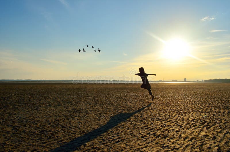 Silhouette of Kid Running on Beach Stock Photo - Image of active ...
