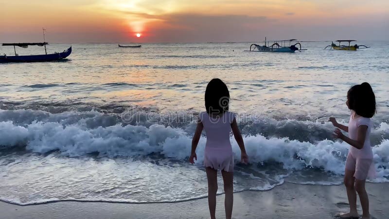 Silhouette of Kids Playing in Beach during Sunset Playing with Waves ...