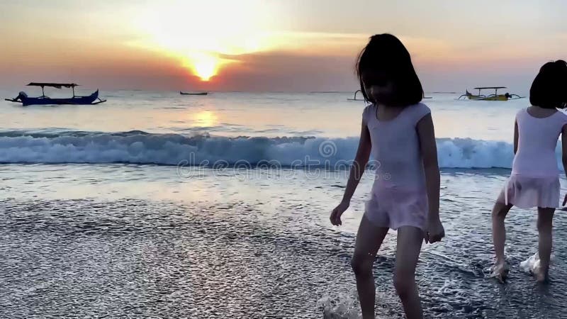 Silhouette of Kids Playing in Beach during Sunset Walking on Water ...