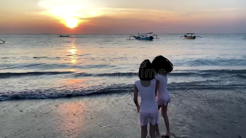 Silhouette of Kids Playing in Beach during Sunset Playing Sand Slow ...