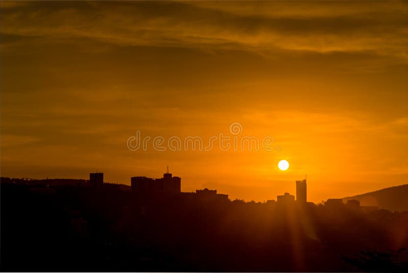 The Silhouette of Kigali City Centre Skyline at Sunset. Rwanda Stock ...