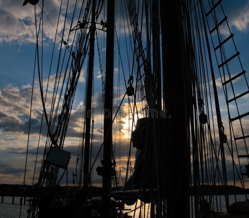 Silhouette of a Large Sailing Vessel Illuminated in the Sunlight Stock ...