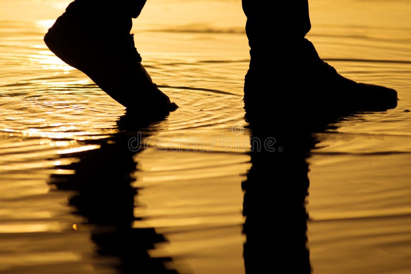 Silhouette legs reflection stock photo. Image of horizon - 42637250