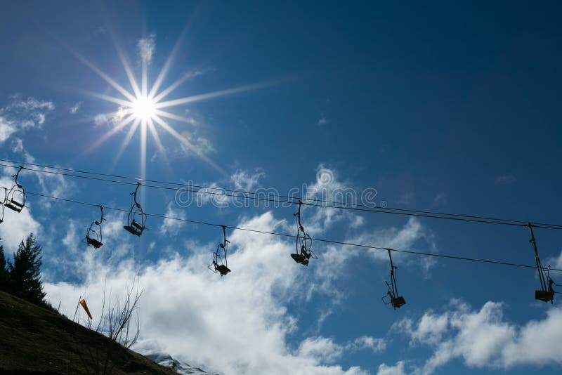 Silhouette Lifts Over the Sun and Blue Sky Stock Image - Image of ...