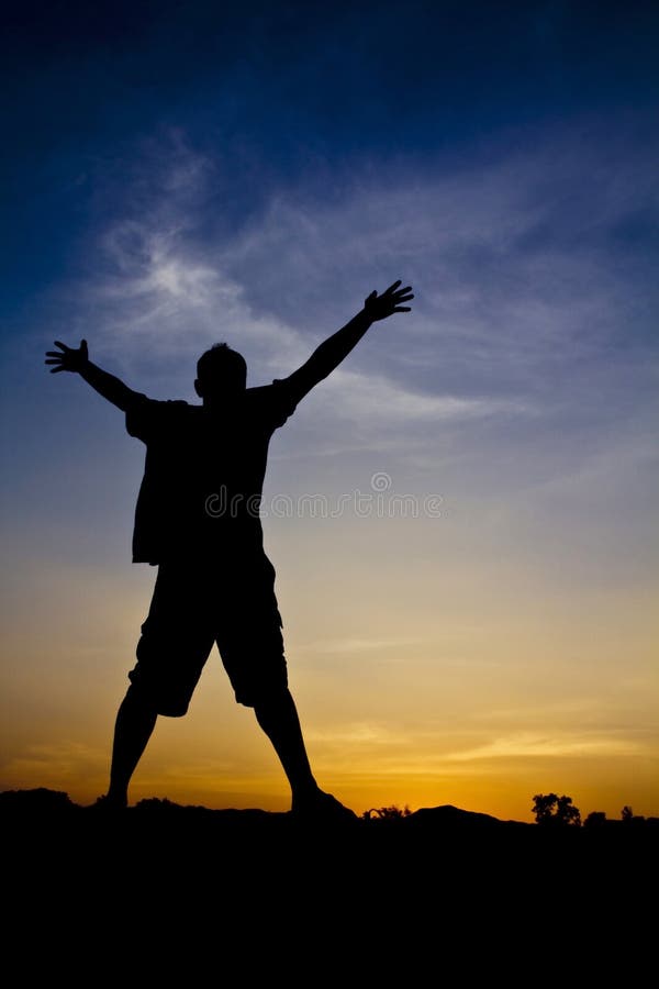 Silhouette of a Man with Arms Lifted Up To the Sky Stock Photo - Image ...