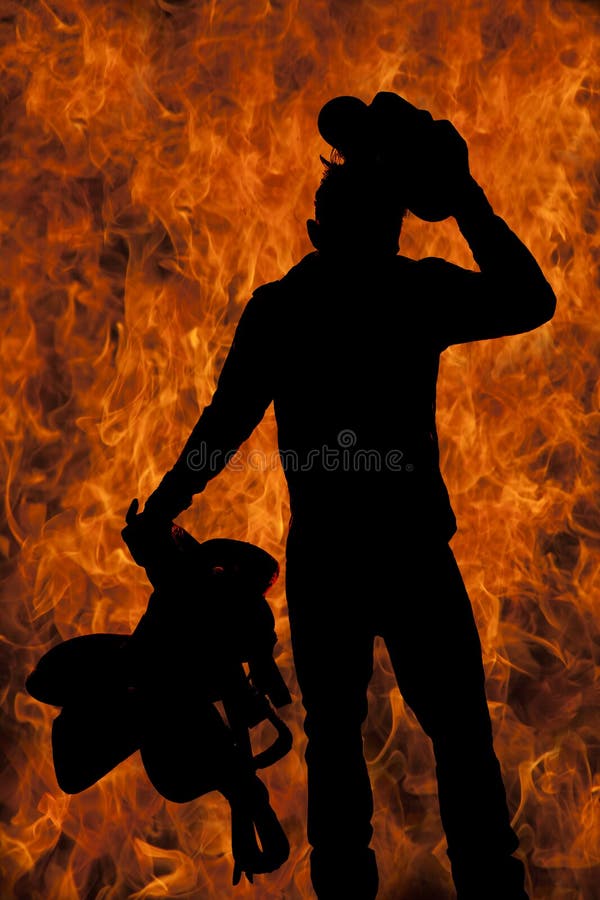 Cowboy silhouetted at dusk stock image. Image of dusk - 10972391