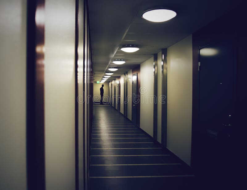 Silhouette of Man in a Dark Hallway. Stock Image - Image of silhouettes ...