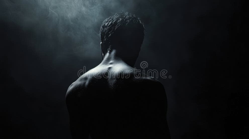 Silhouette of a Man Emerging from Deep Shadows Stock Photo - Image of ...