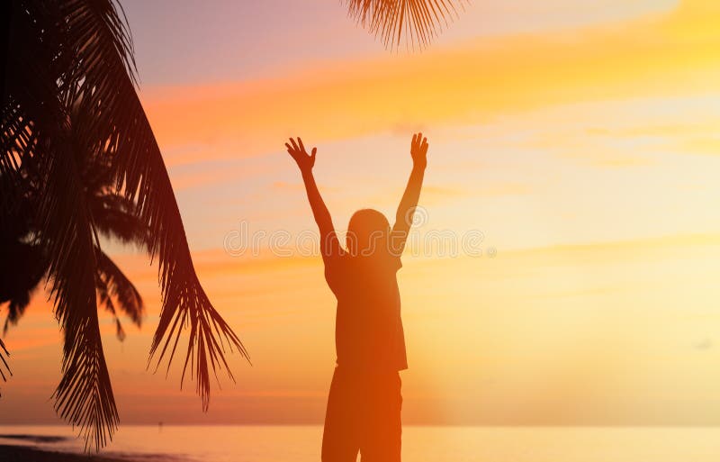 Silhouette of Man with His Hands Up at Sunset Stock Image - Image of ...