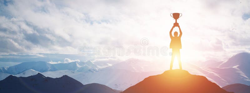 Silhouette of a Man Holding a Trophy at Sunset Stock Image - Image of ...