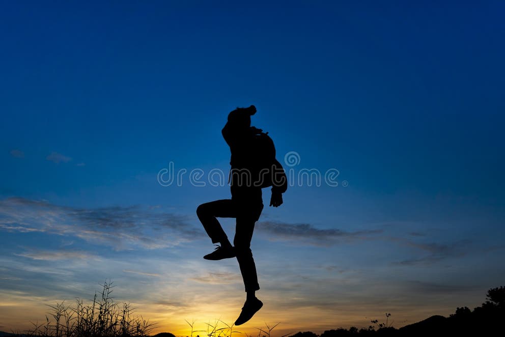 Silhouette Man Jump of Sunset Sky Stock Photo - Image of happiness ...