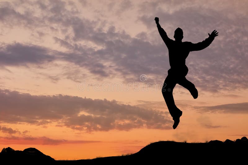 Silhouette of a Man Jumping in the Sunset Stock Image - Image of ...