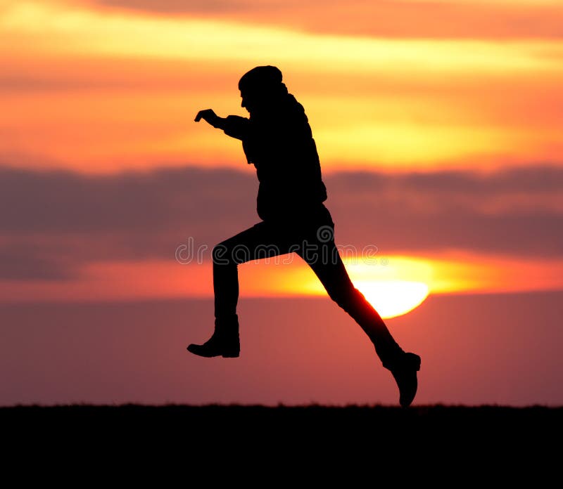 Silhouette Of Man Jumping In Sunset Stock Photo - Image of human ...